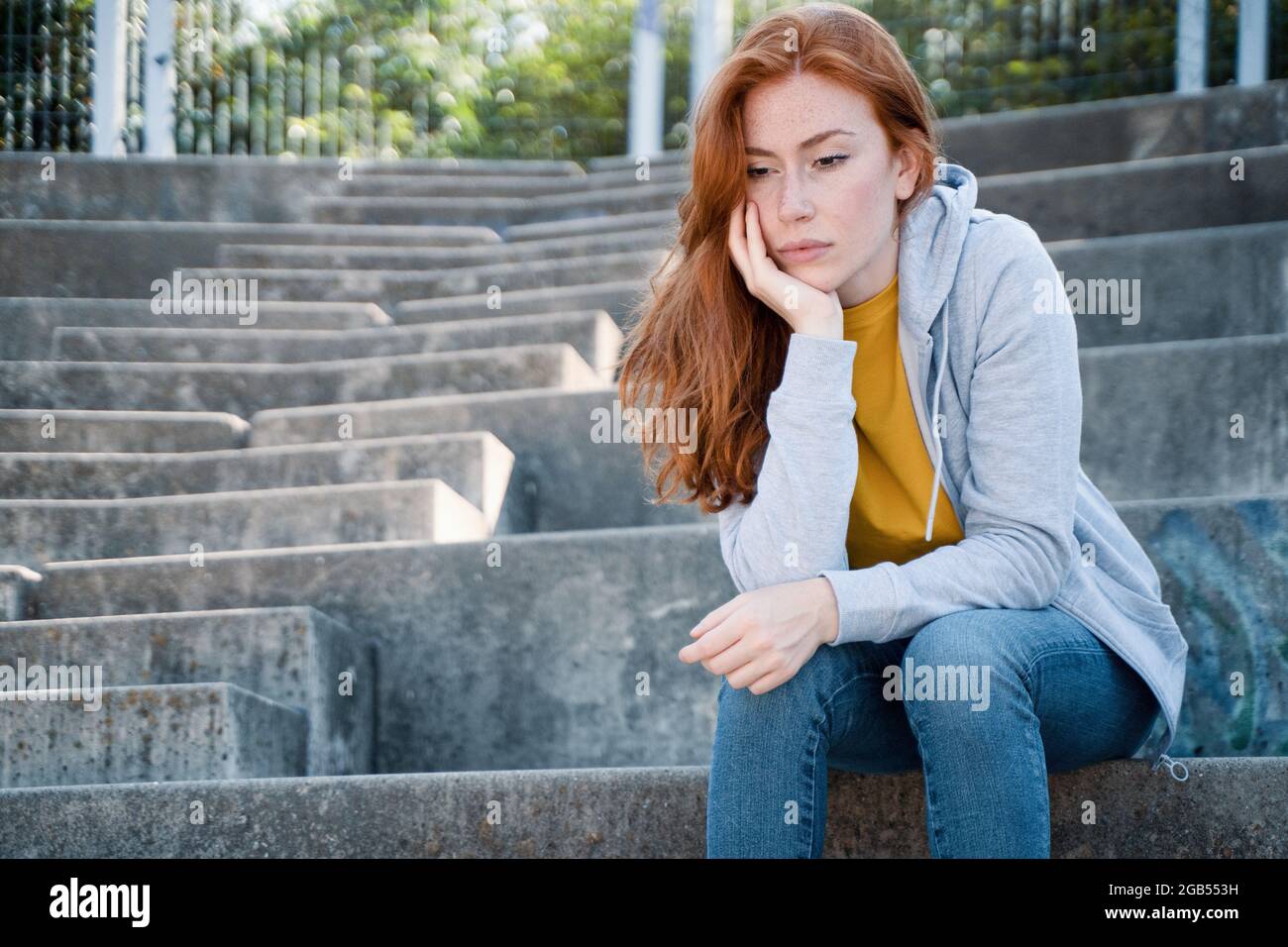 One depressed young woman feeling negative feelings Stock Photo - Alamy