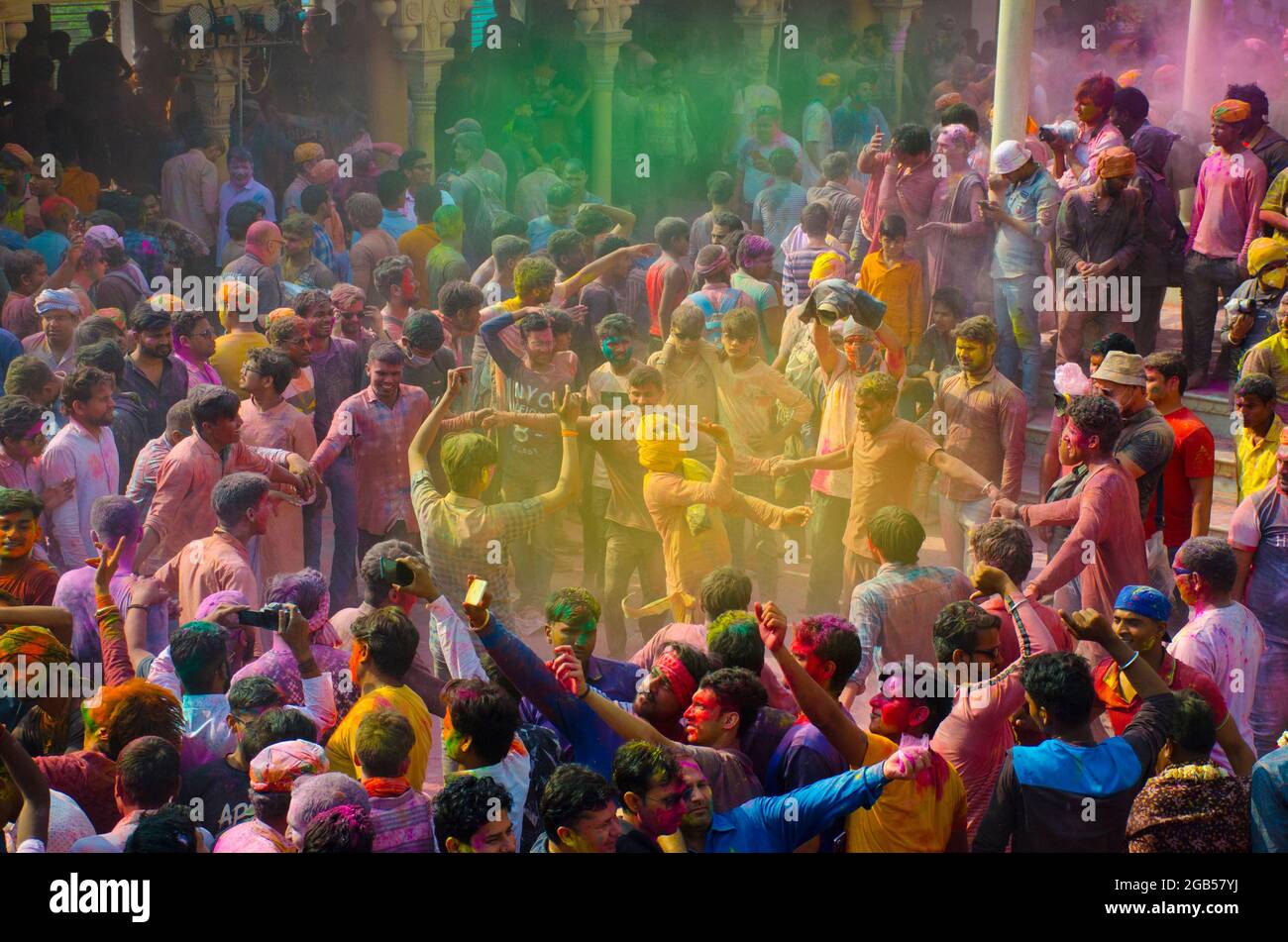 Pilgrims are mingled in colors while celebrating the color festival ...