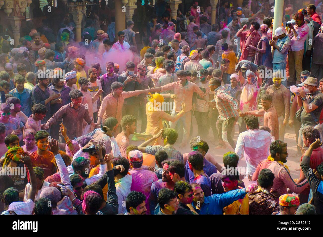 Pilgrims are mingled in colors while celebrating the color festival ...
