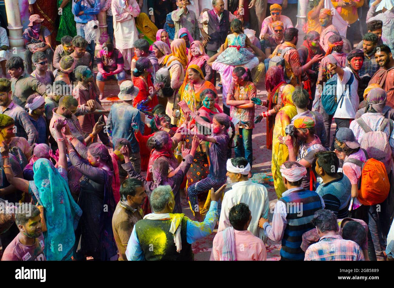 Pilgrims are mingled in colors while celebrating the color festival ...