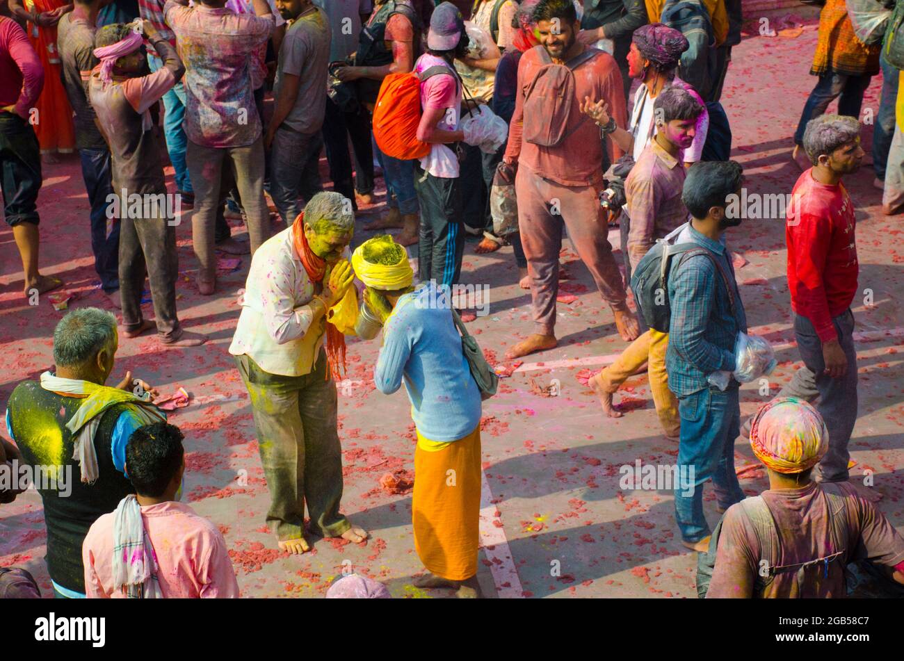 An act of courtesy! Two devotees of Goddess Radha are bowing down each ...