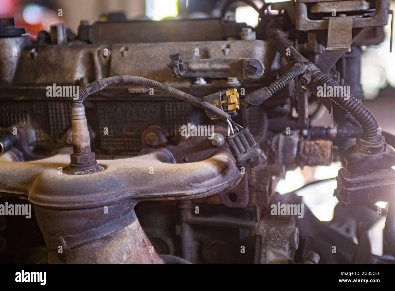 Detail of old and rusty car engine in a workshop Stock Photo - Alamy