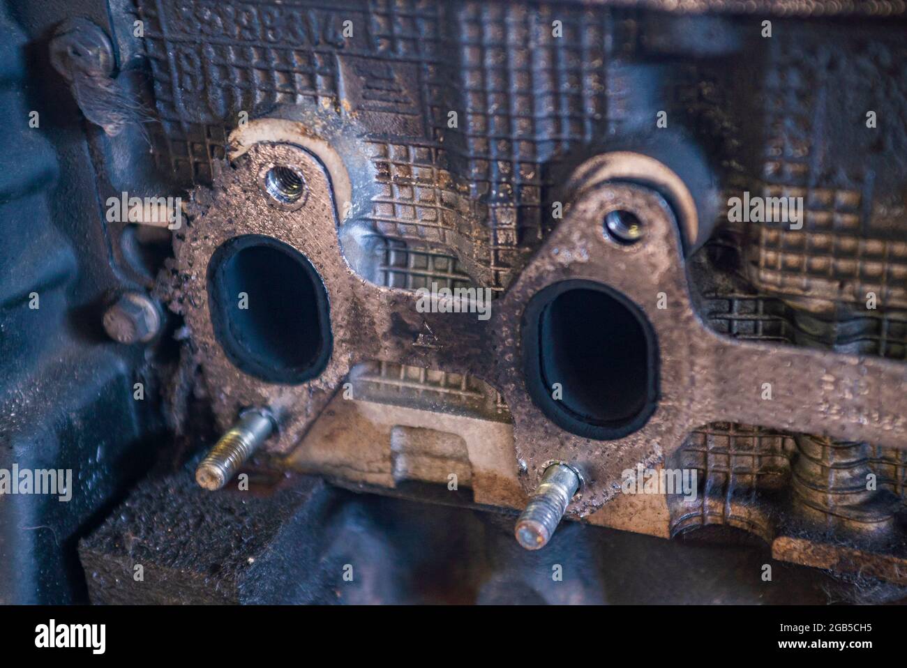 Detail of old and rusty car engine in a workshop Stock Photo - Alamy