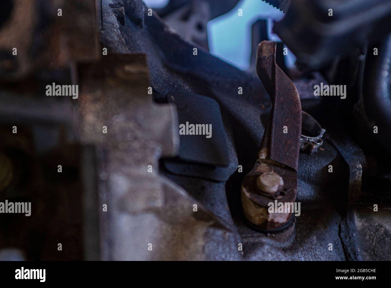 Detail of old and rusty car engine in a workshop Stock Photo - Alamy