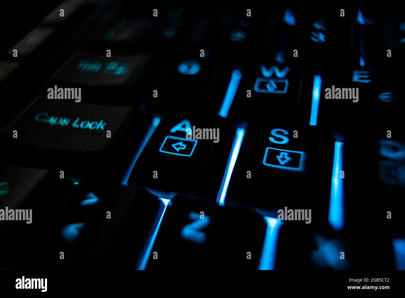 Backlit keyboard detail illuminated in the dark Stock Photo - Alamy