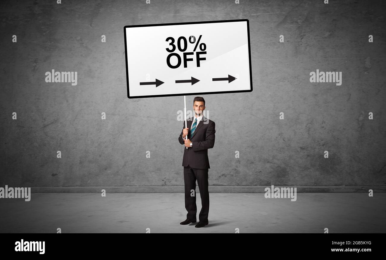 business person holding a traffic sign Stock Photo - Alamy