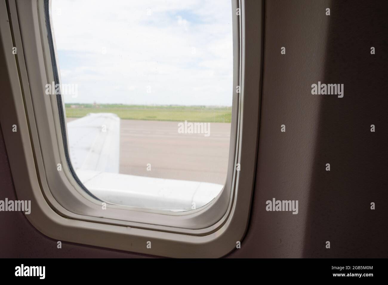 View of the window from inside the aircraft Stock Photo - Alamy