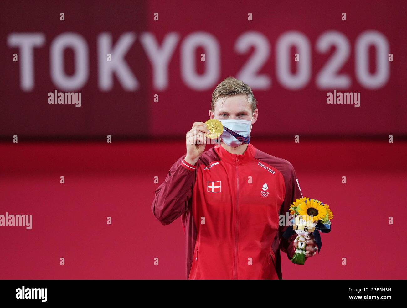 Tokyo, Japan. 2nd Aug, 2021. Viktor Axelsen of Denmark shows his gold ...