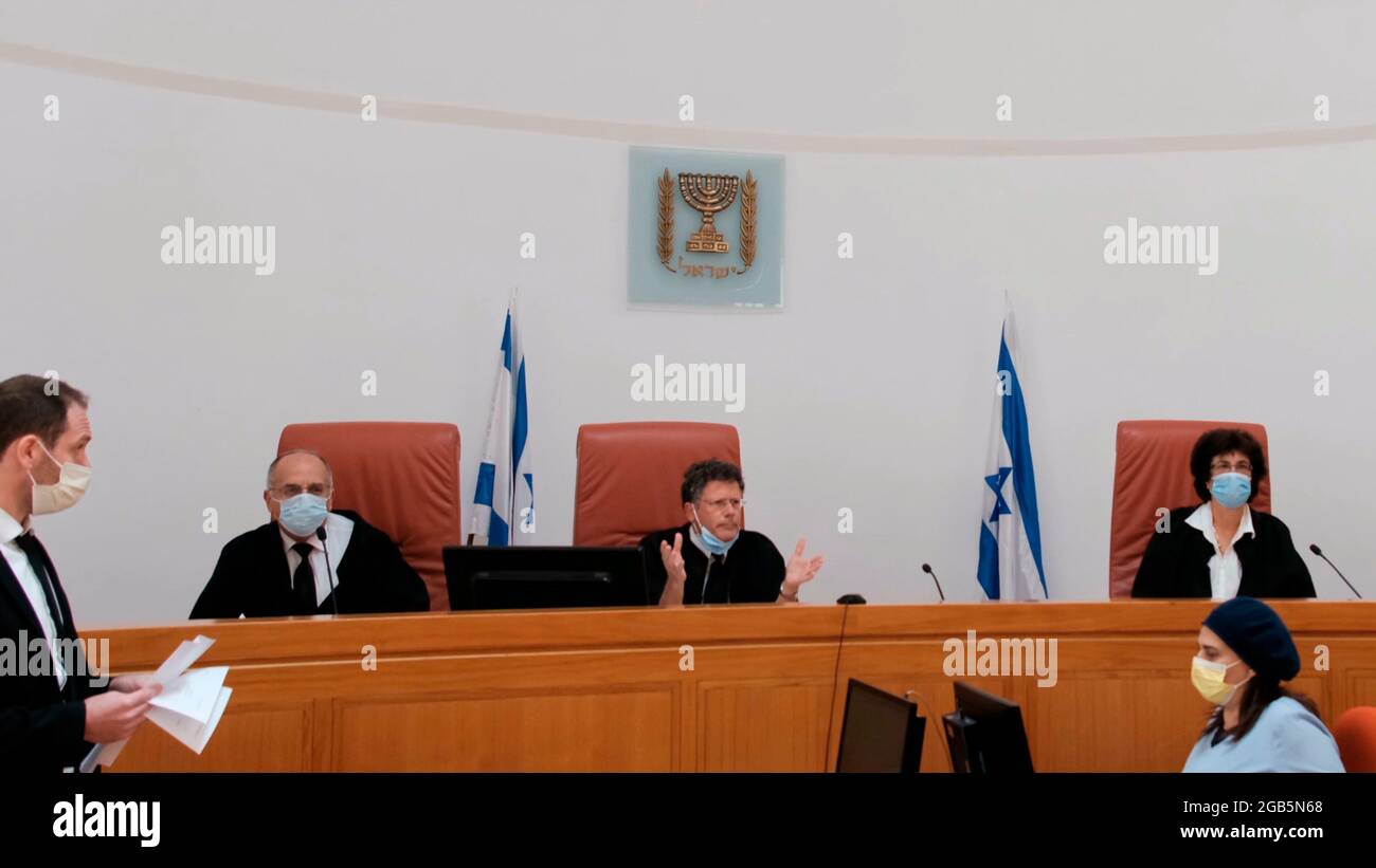 Judges and personnel of the Israeli Supreme Court attend a session ...
