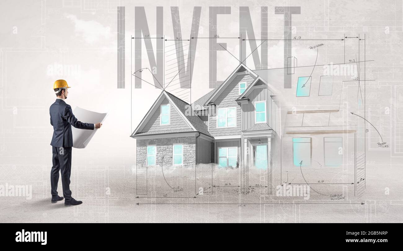 Young engineer holding blueprint Stock Photo - Alamy