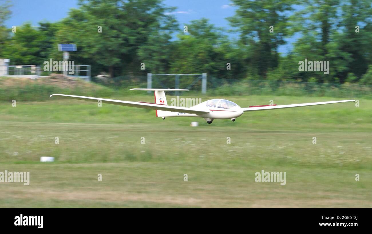 Thiene Italy, JULY, 8, 2021 Glider, sailplane, takes off towed by an ...