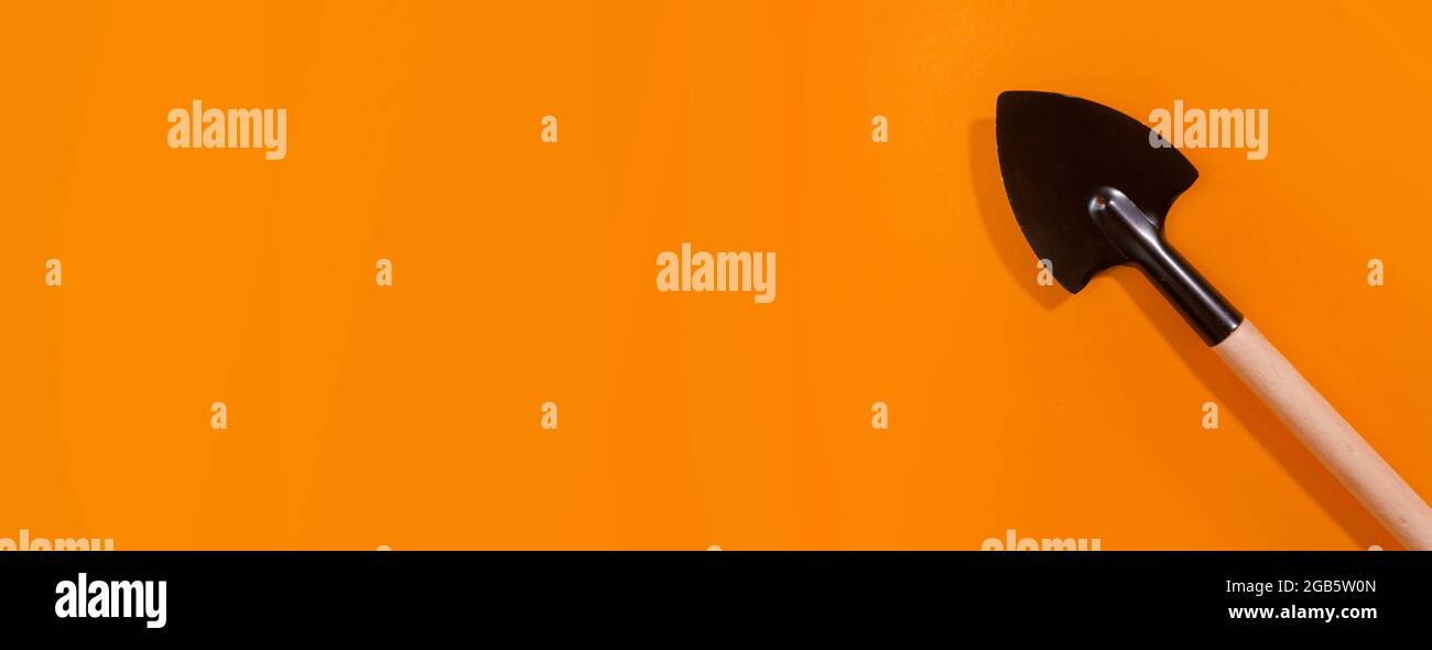 panorama of garden tools on orange background Stock Photo - Alamy