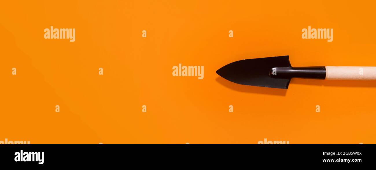 panorama of garden tools on orange background Stock Photo - Alamy