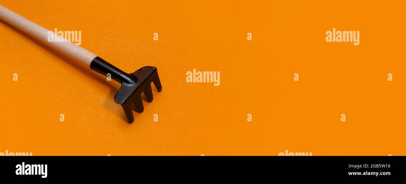 panorama of garden tools on orange background Stock Photo - Alamy