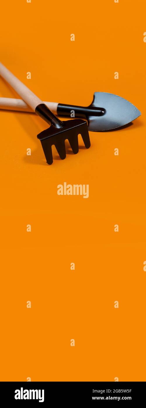 panorama of garden tools on orange background Stock Photo - Alamy