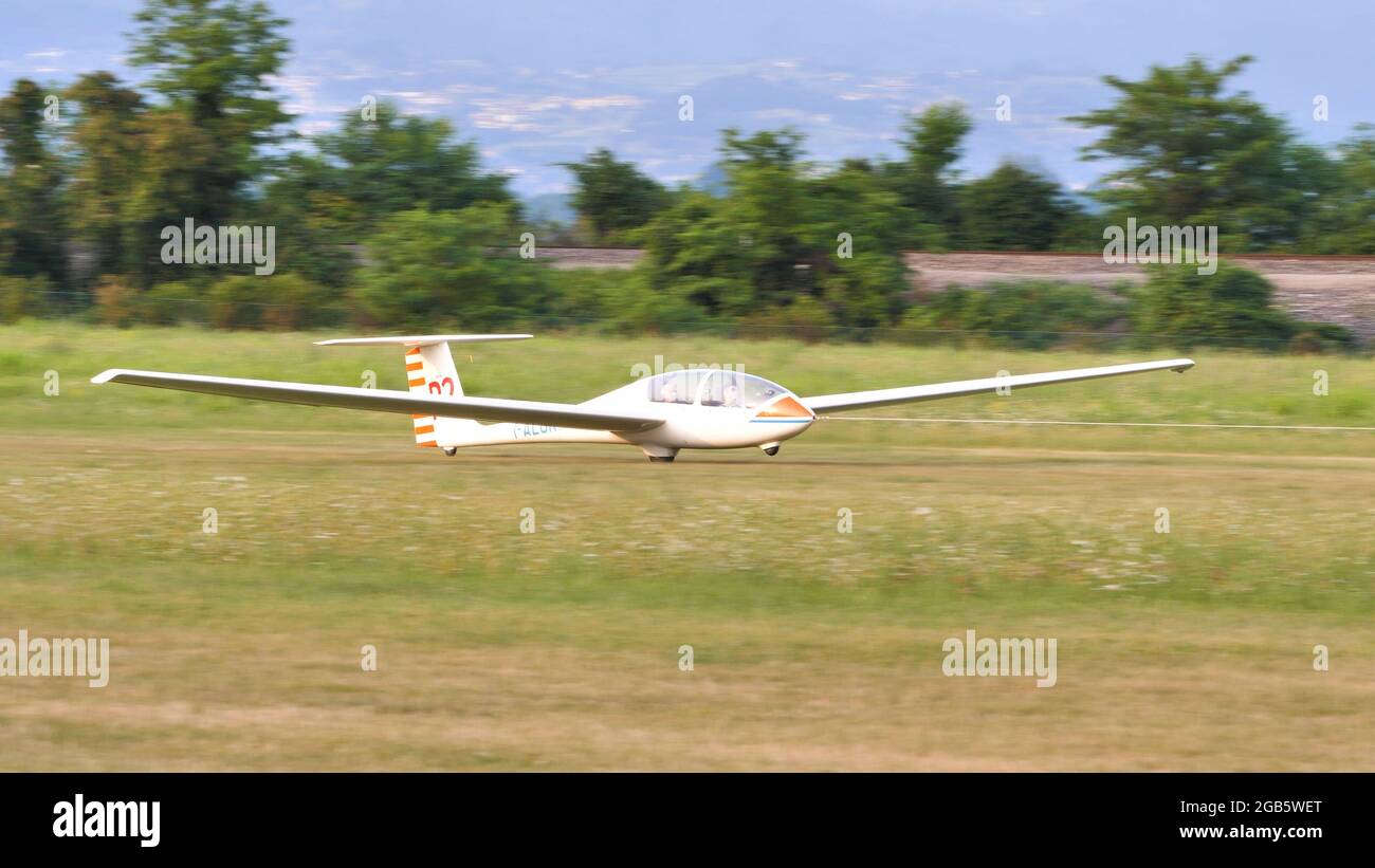 Thiene Italy, JULY, 8, 2021 Glider ready to take off towing with a rope ...