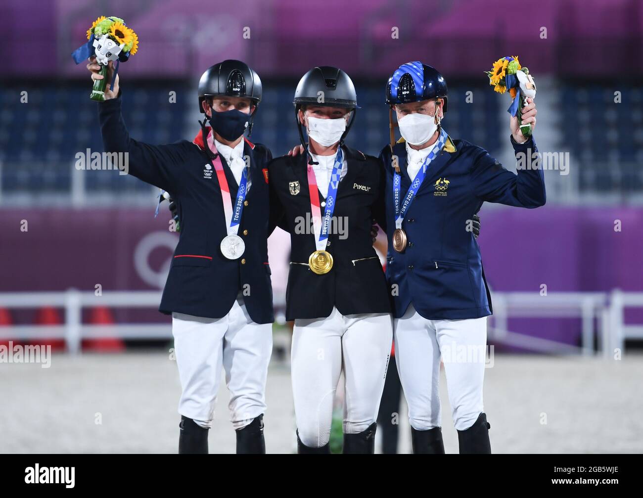 Tokyo, Japan. 2nd Aug, 2021. Julia Krajewski (C) of Germany, Tom McEwen ...