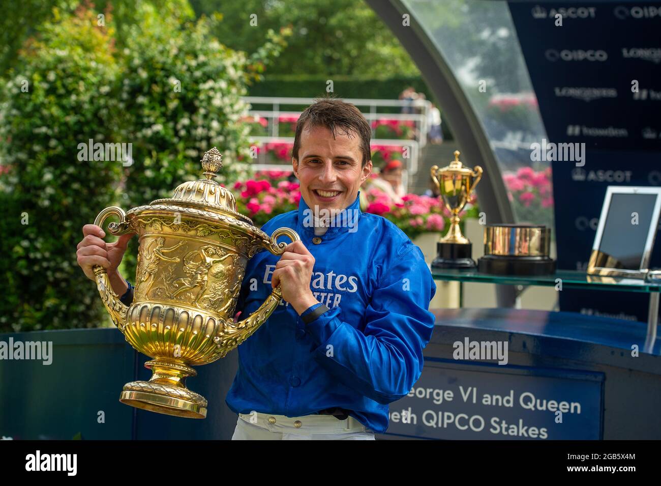 Ascot, Berkshire, UK. 24th July, 2021. Jockey William Buick holds the ...