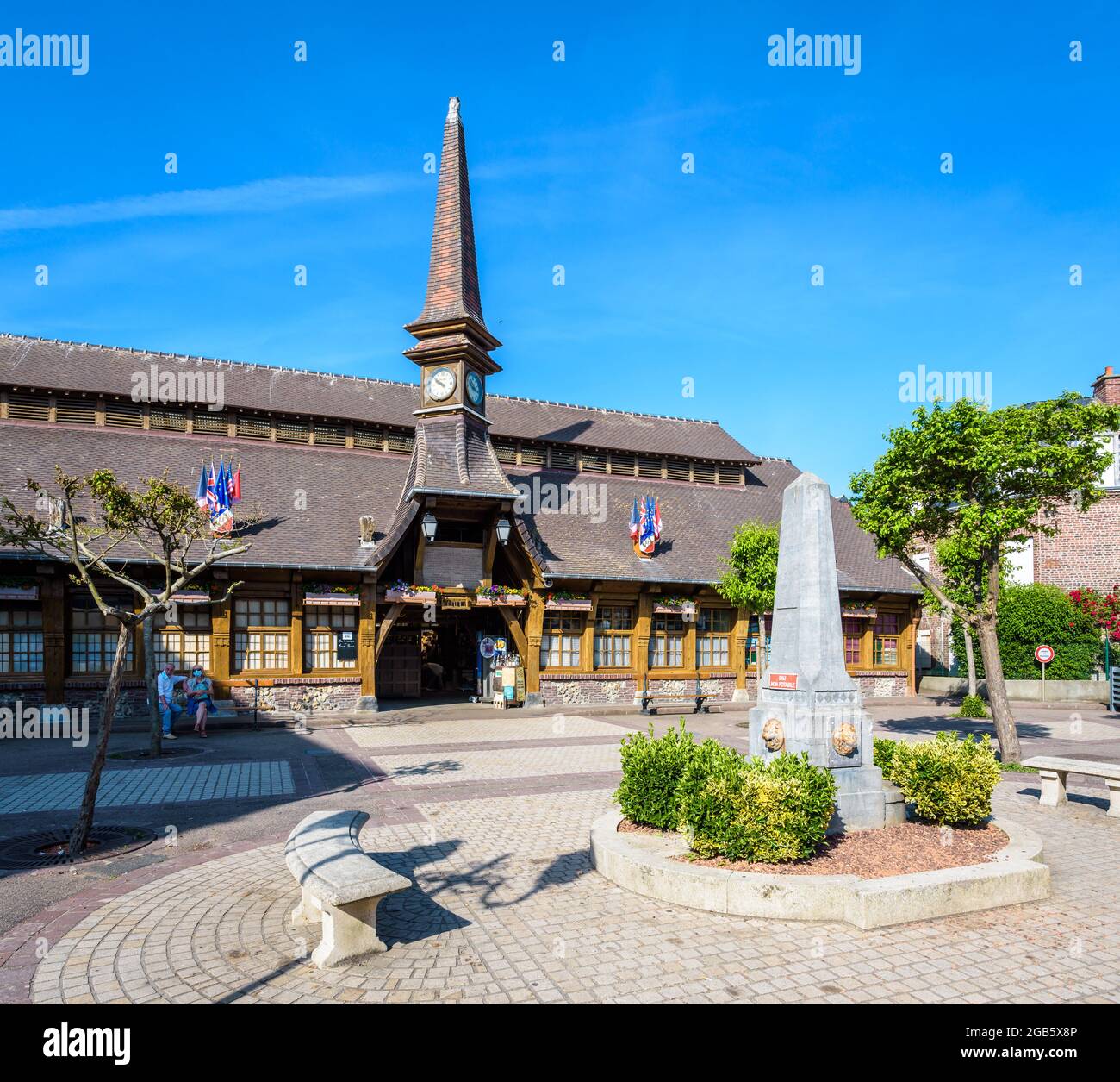 The Marechal Foch square in Etretat, France, with the Old Market, a ...