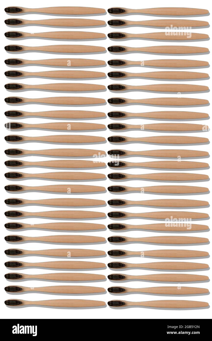 Texture of wooden toothbrushes with black bristles Stock Photo - Alamy