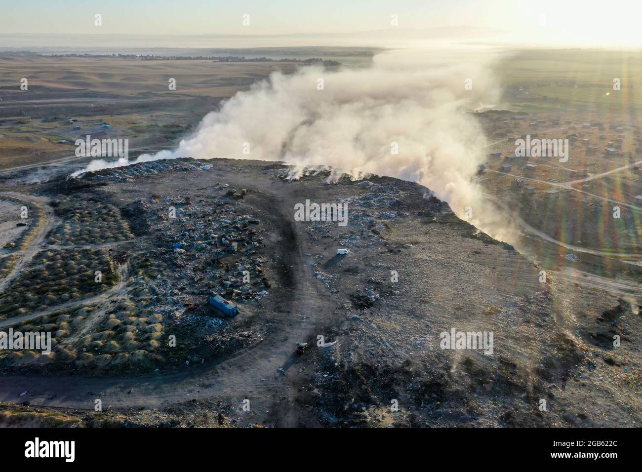 Aerial view of burning garbage pile in trash dump or landfill Stock ...