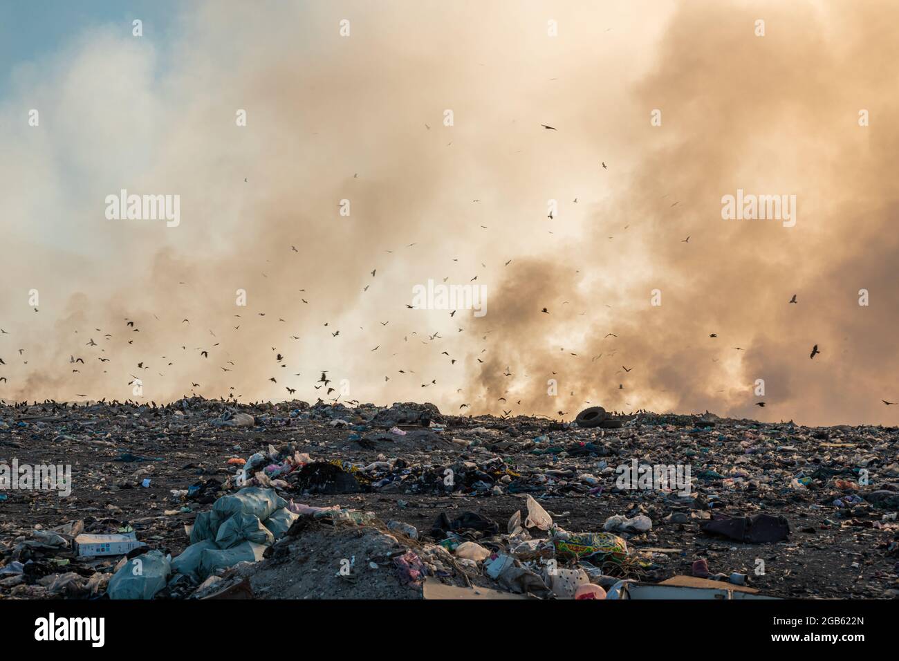 Pollution concept, Burning garbage pile in trash dump or landfill Stock ...
