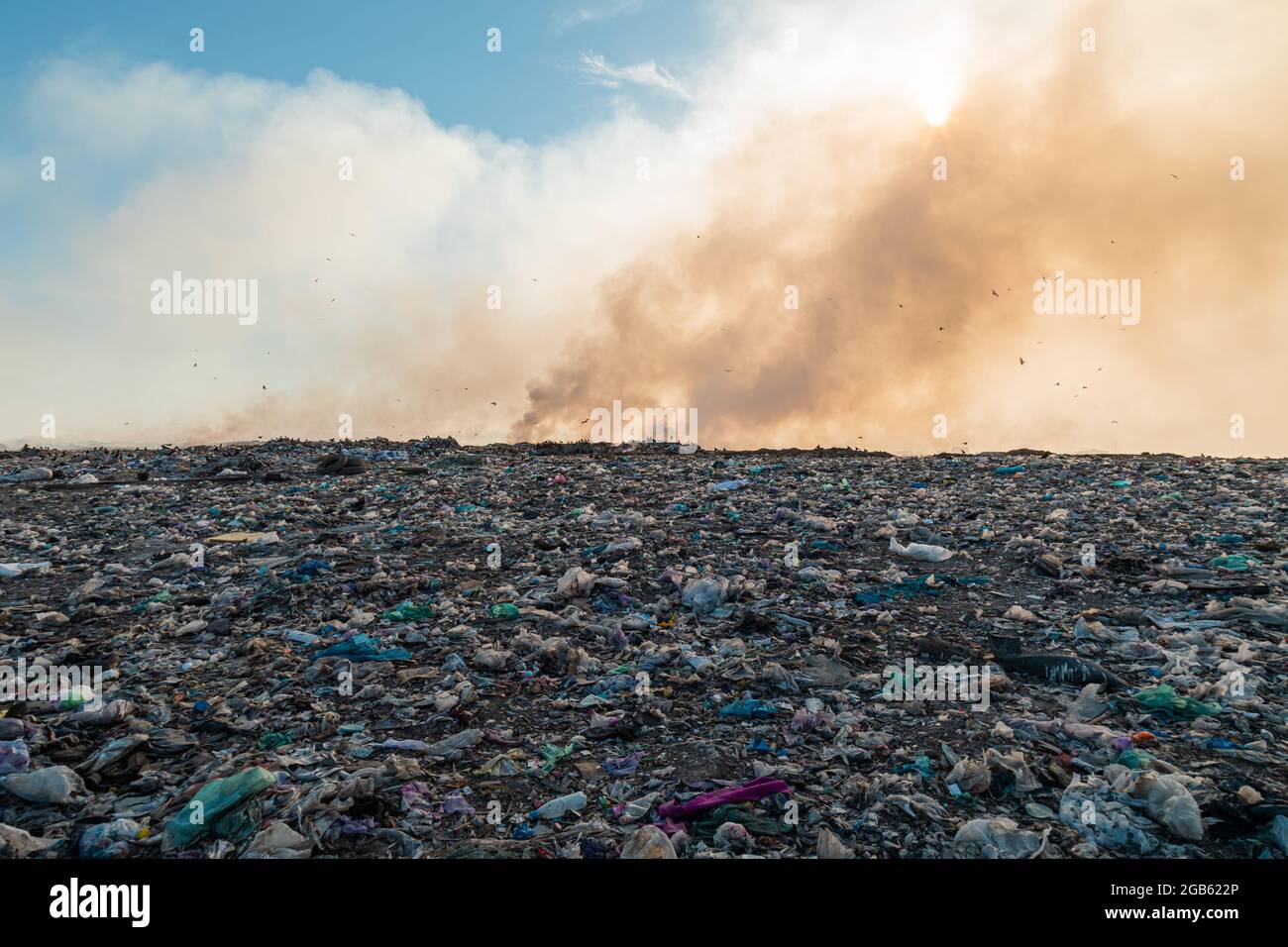 Pollution concept, Burning garbage pile in trash dump or landfill Stock ...