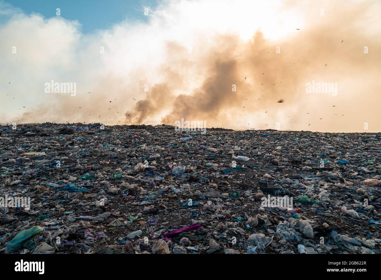Pollution concept, Burning garbage pile in trash dump or landfill Stock ...