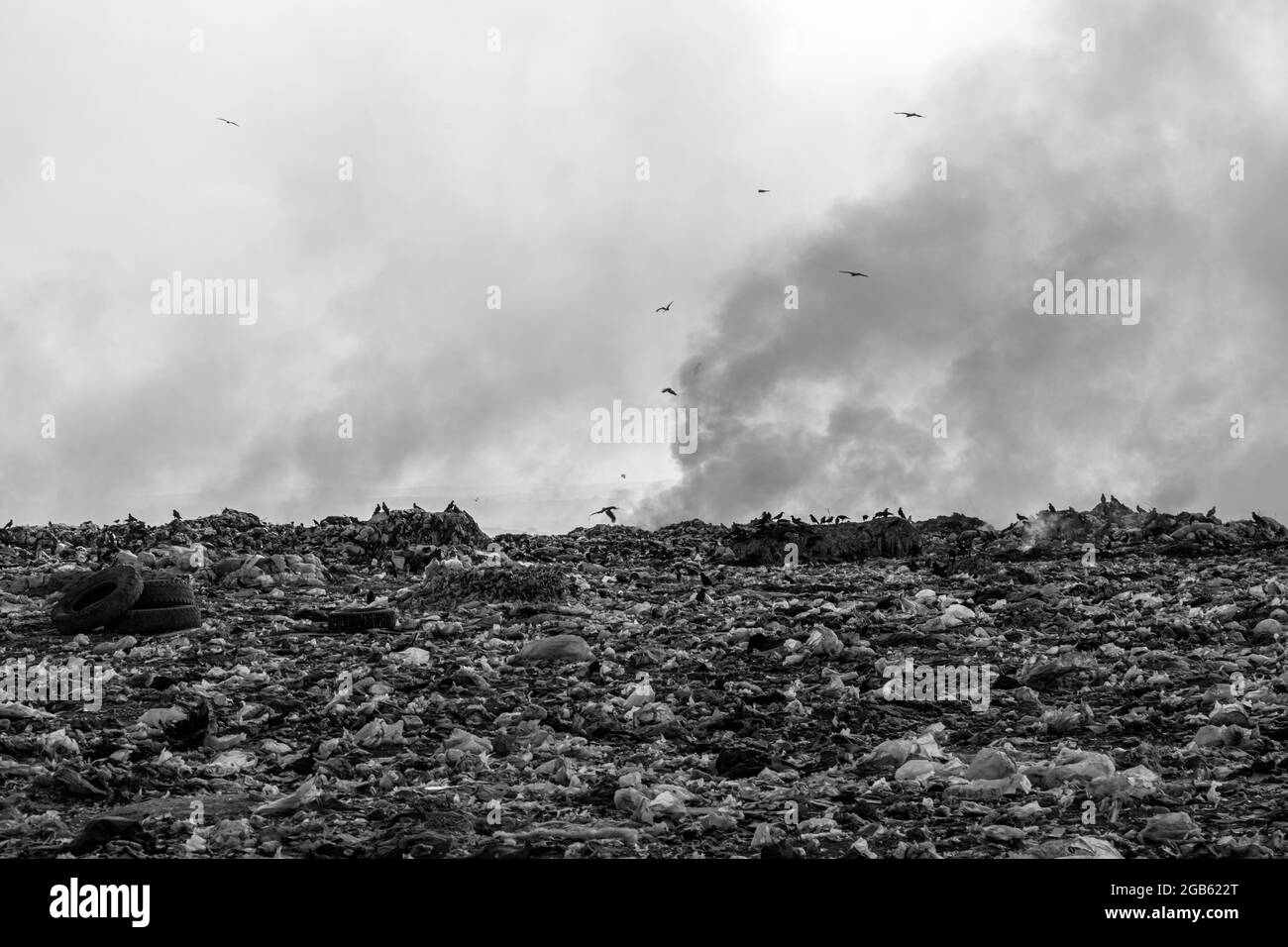 Pollution concept, Burning garbage pile in trash dump or landfill ...