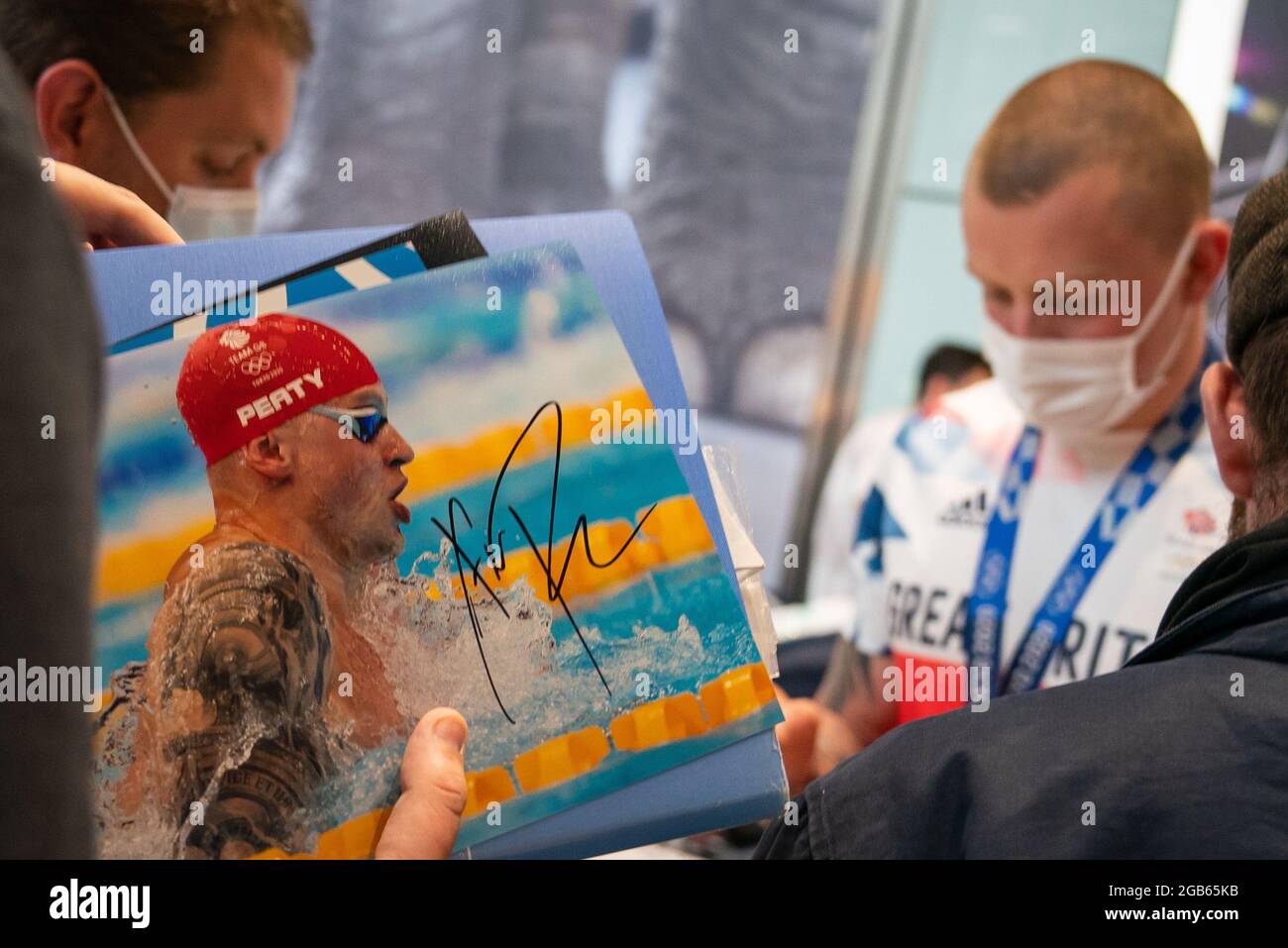 British swimmer Adam Peaty arrives back at London Heathrow Airport from ...