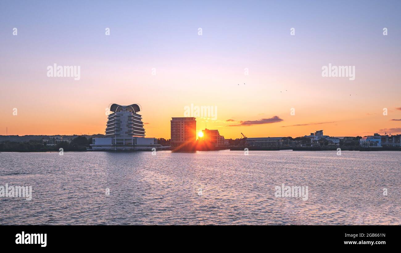 Photo of a sunset over Cardiff Bay waterfront in Cardiff, UK Stock ...