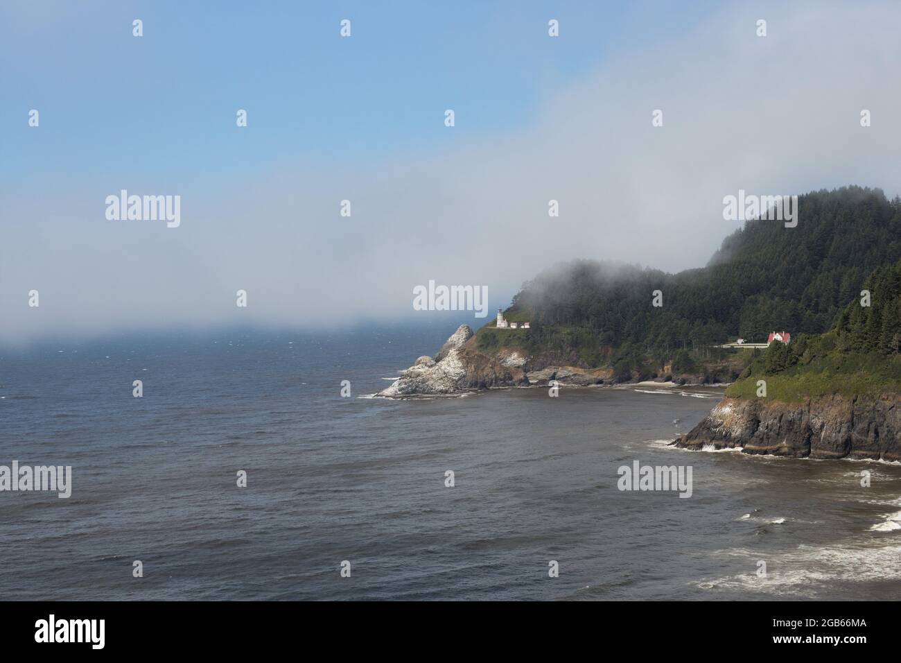 Fog rolling over Heceta Head lighthouse near Florence, Oregon Stock ...