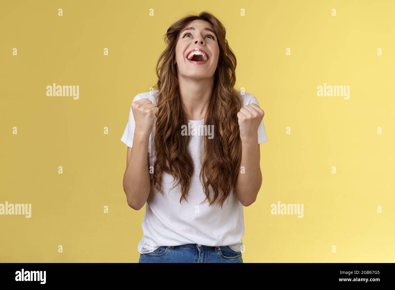 God finally yes. Relieved thankful pleased happy girl look up thank god ...