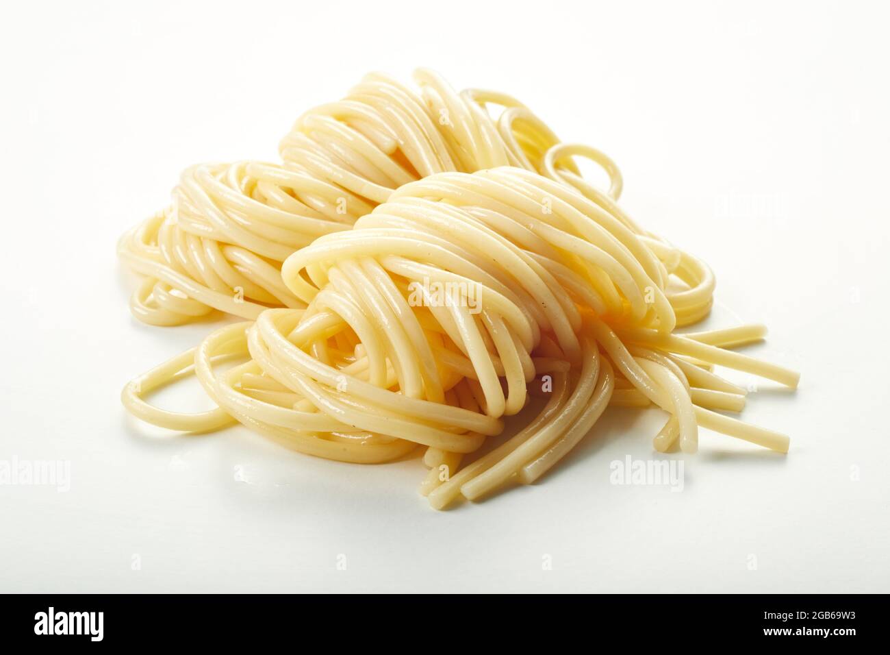 Pile of yummy boiled spaghetti for traditional Italian lunch placed on ...