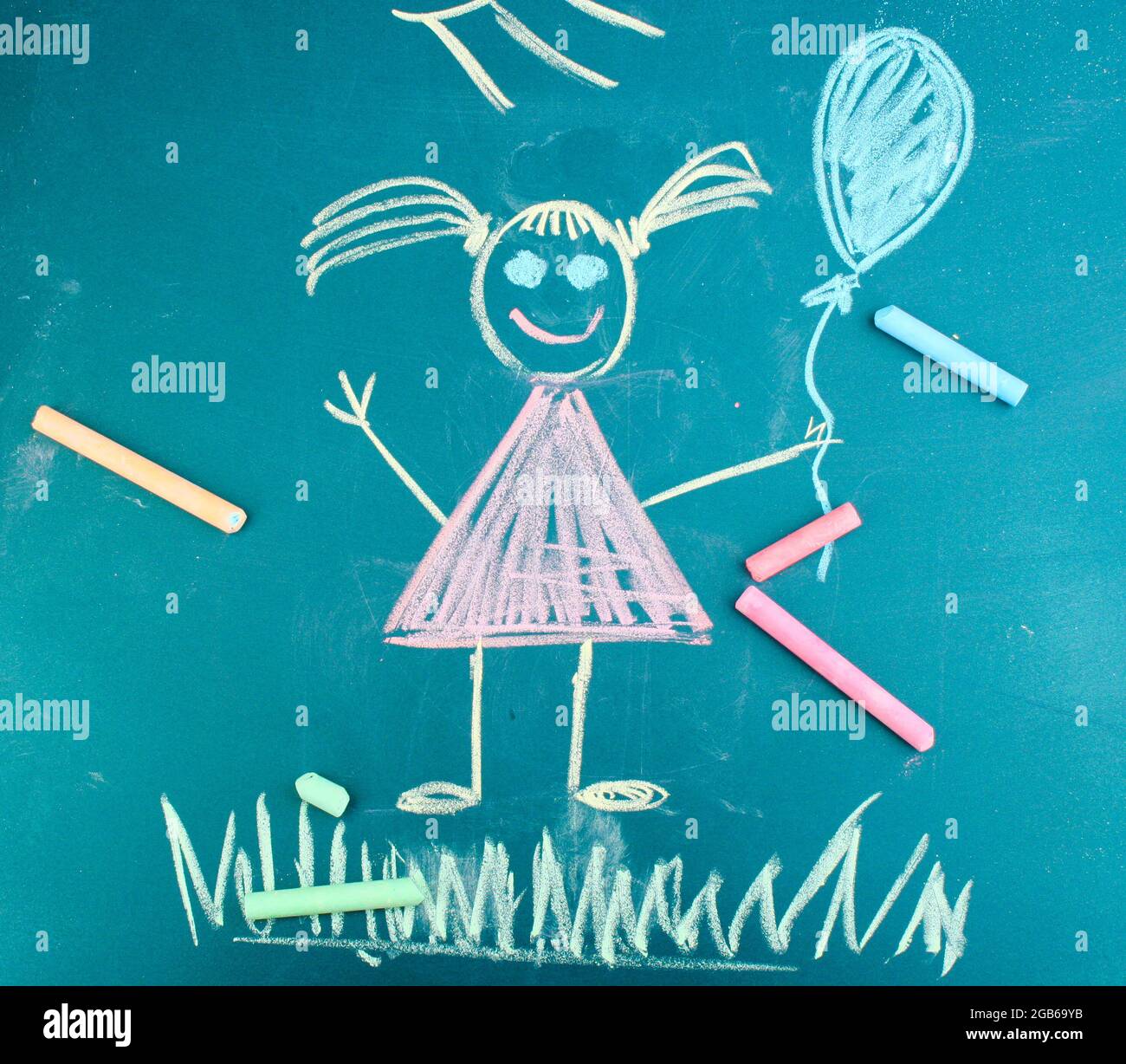 Little girl, child's drawing with chalk Stock Photo - Alamy