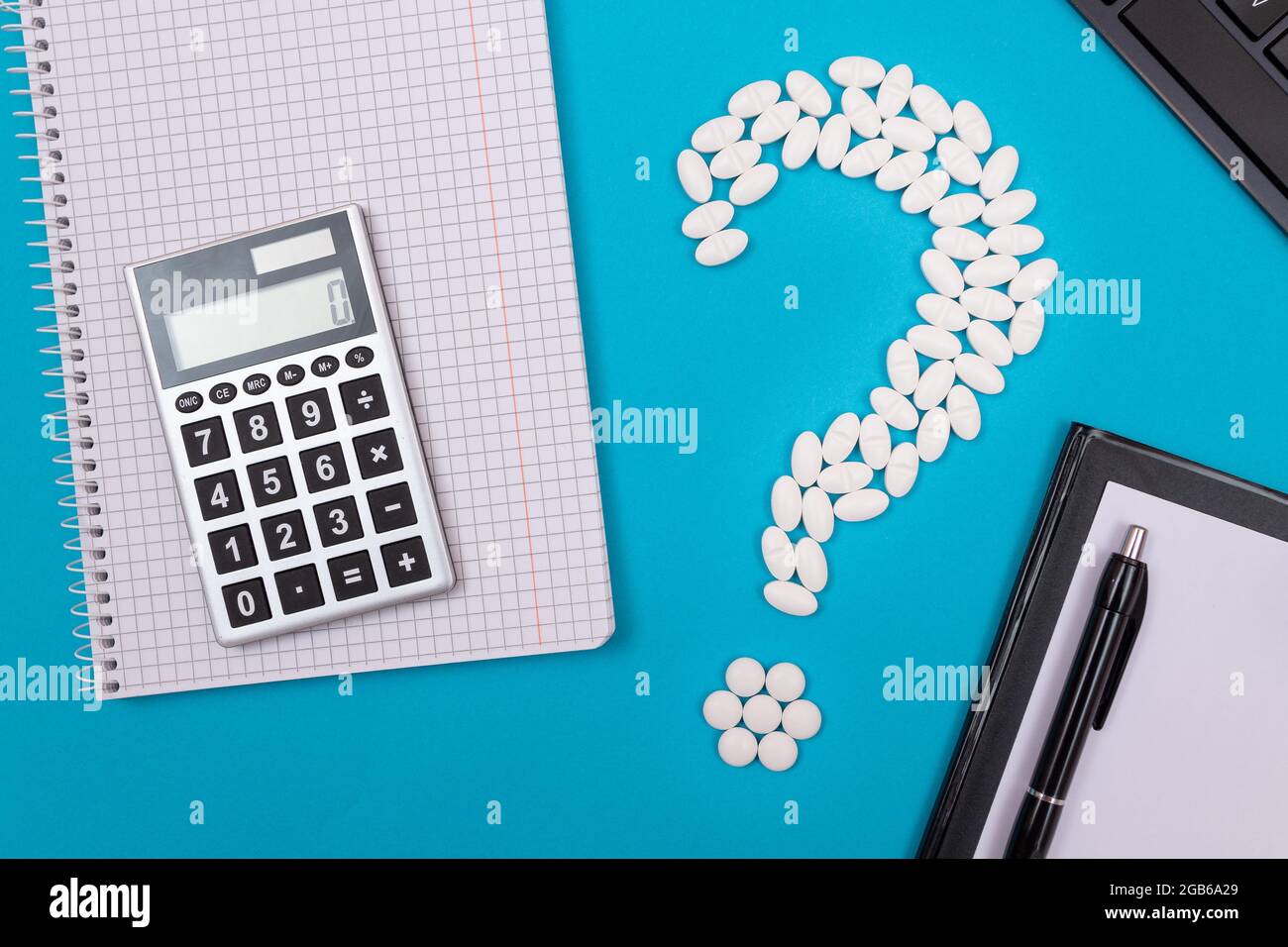 Treatment Costs and Budget. Question Mark Made from White Pills and ...