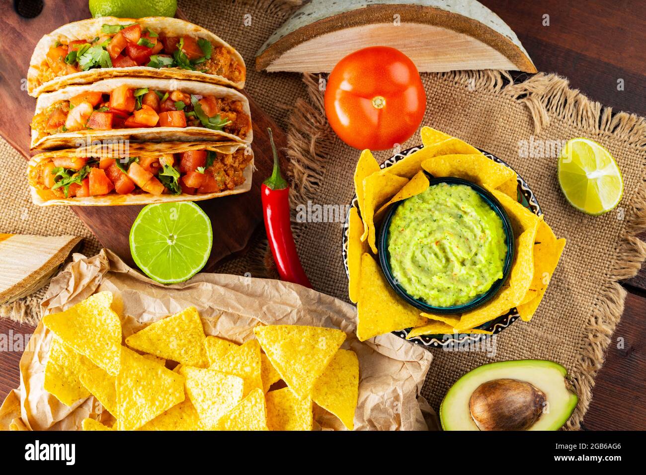 Mexican food panorama. Nachos, guacamole, tacos and ingredients on ...