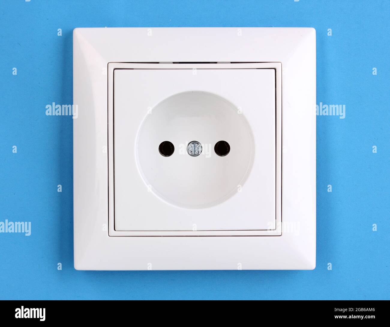 White electric socket on the wall Stock Photo - Alamy