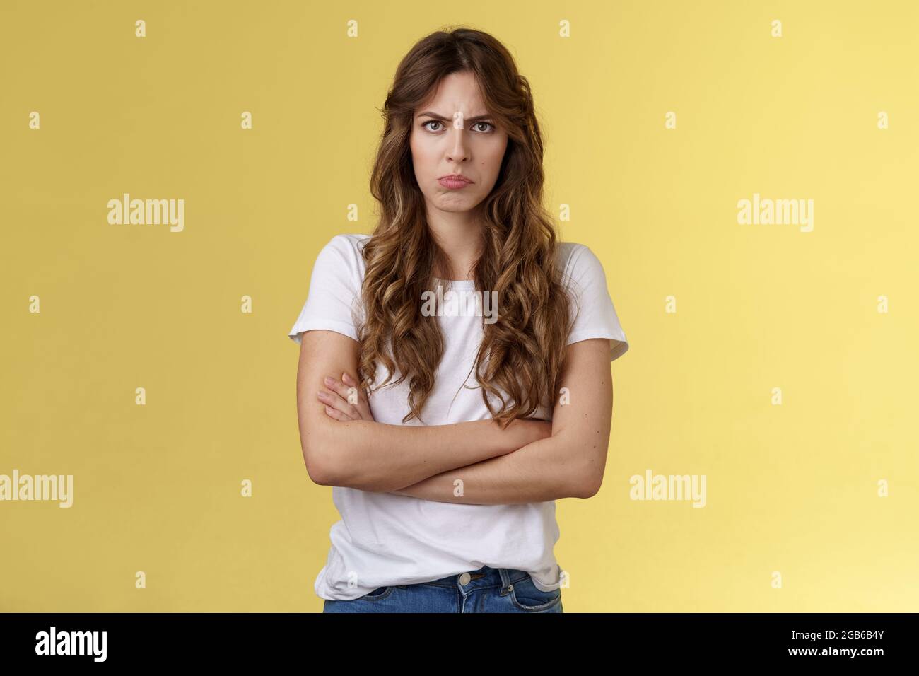 Upset jealous moody clingy girlfriend sulking offended cross hands ...