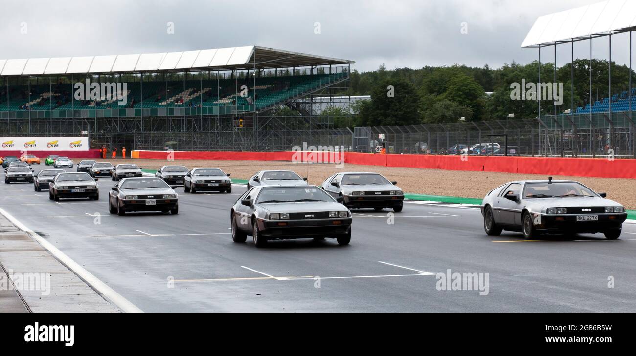 A track parade celebrating the 40th Anniversary of the DeLorean DMC-12 ...