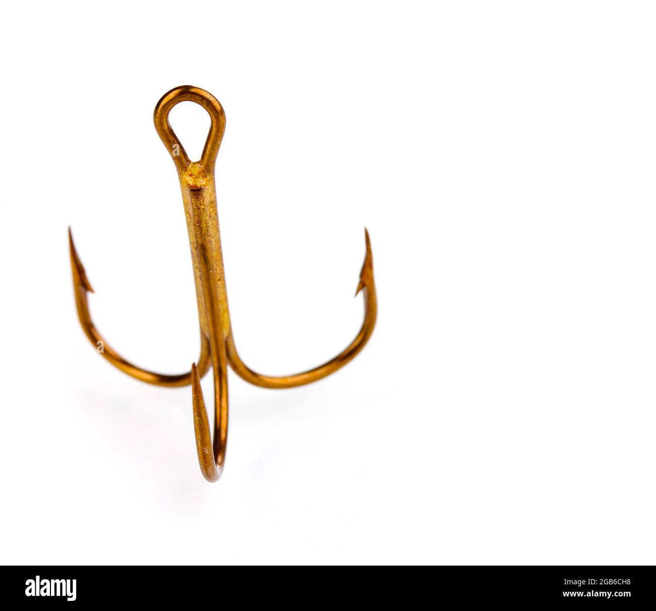 Treble fish hook isolated on white Stock Photo - Alamy