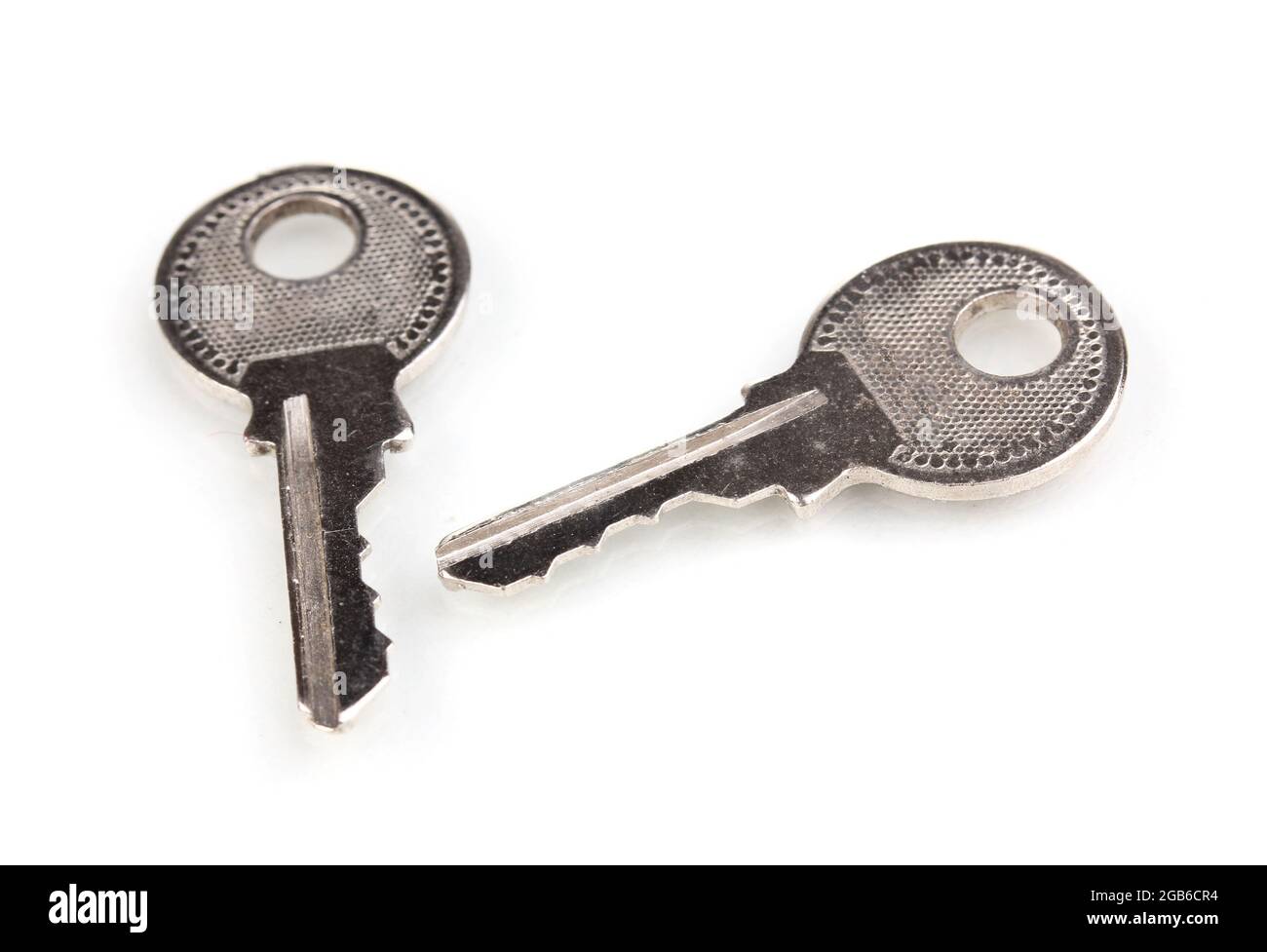Two metal keys isolated on white Stock Photo - Alamy