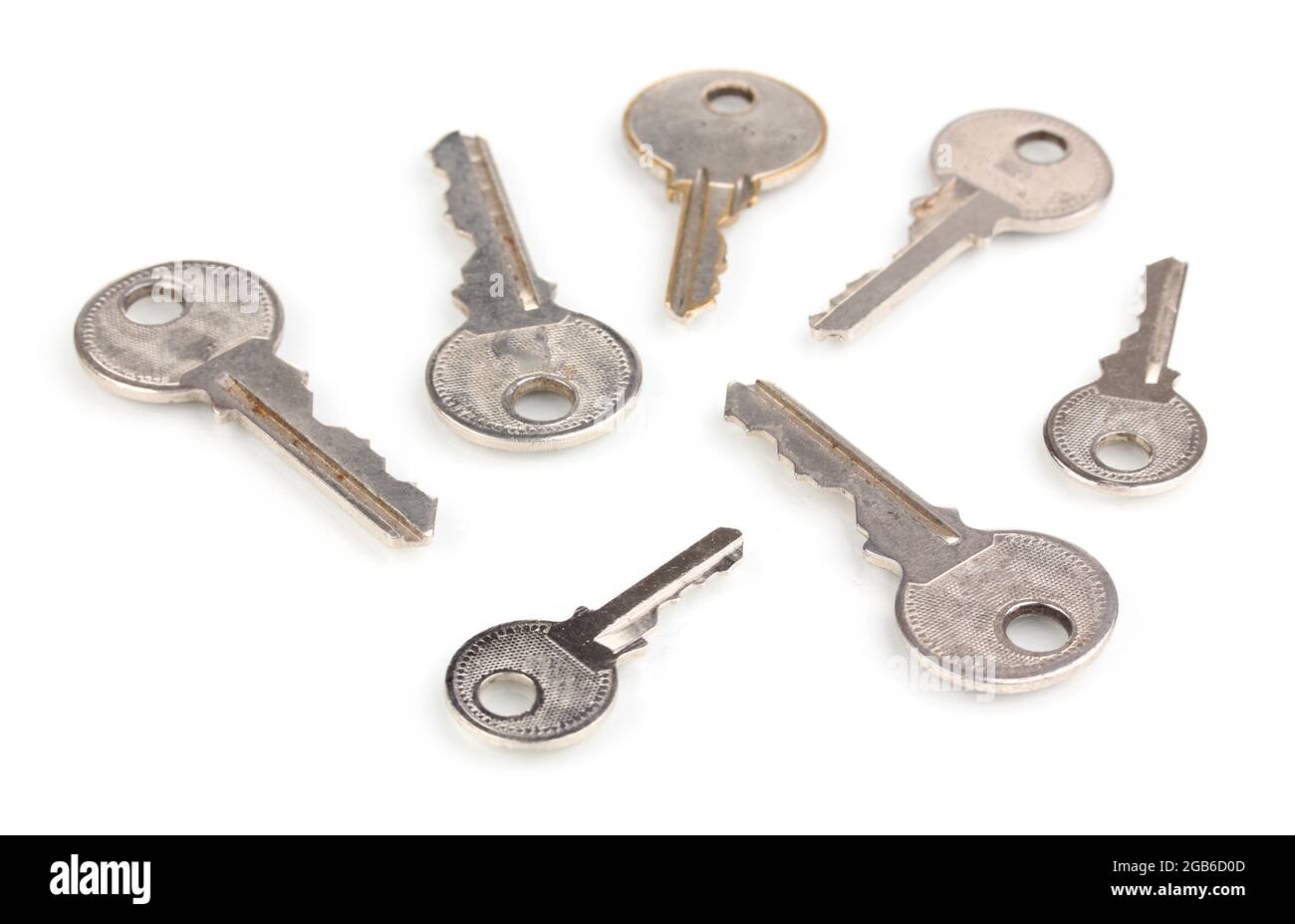 Many metal keys isolated on white Stock Photo - Alamy