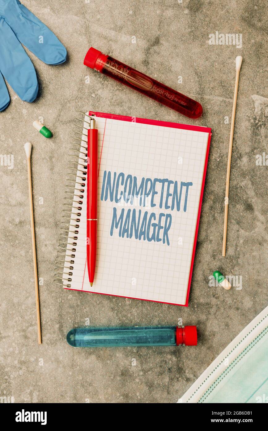 Writing displaying text Incompetent Manager, Concept meaning Lacking ...