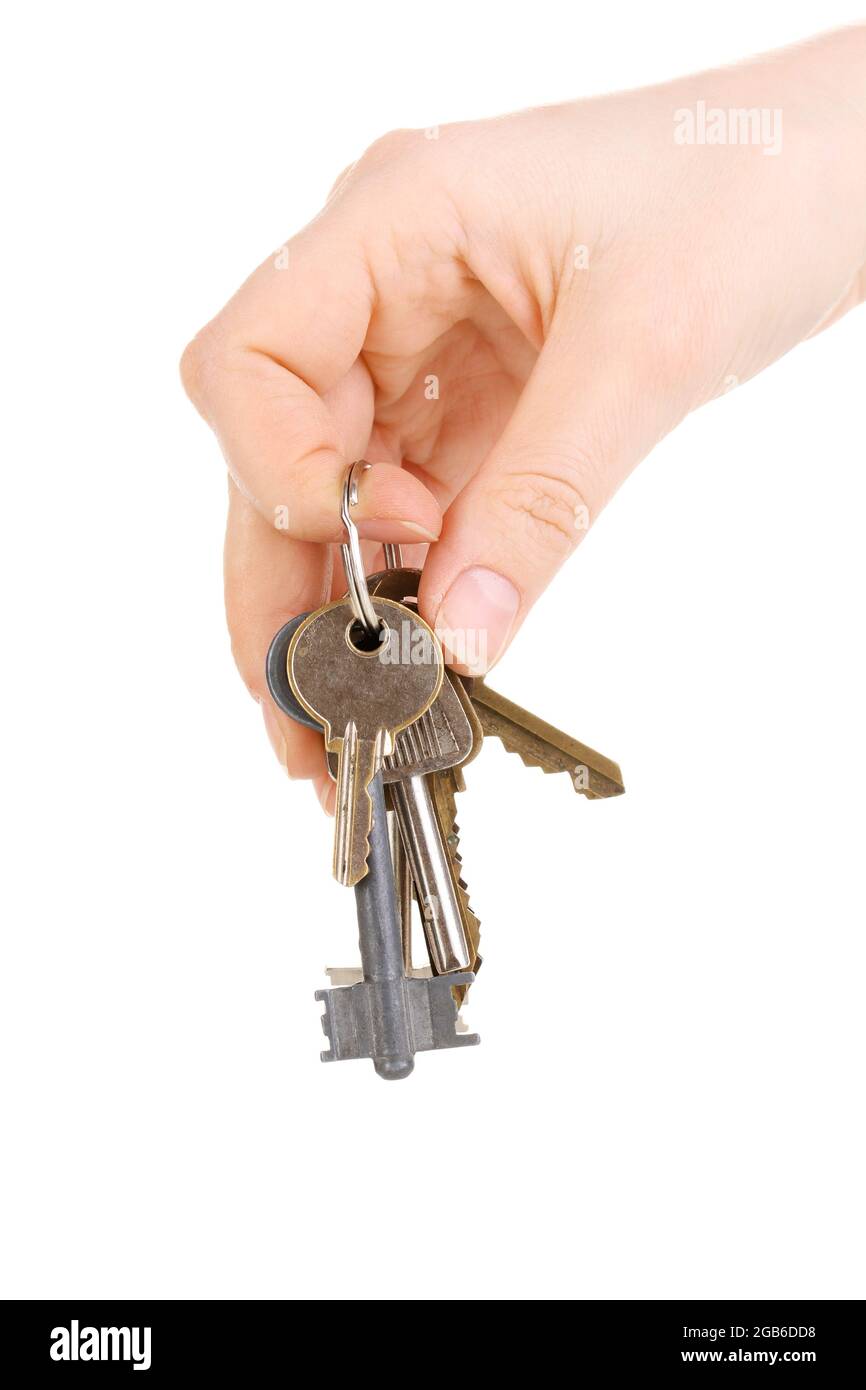Bunch of keys in hand isolated on white Stock Photo - Alamy