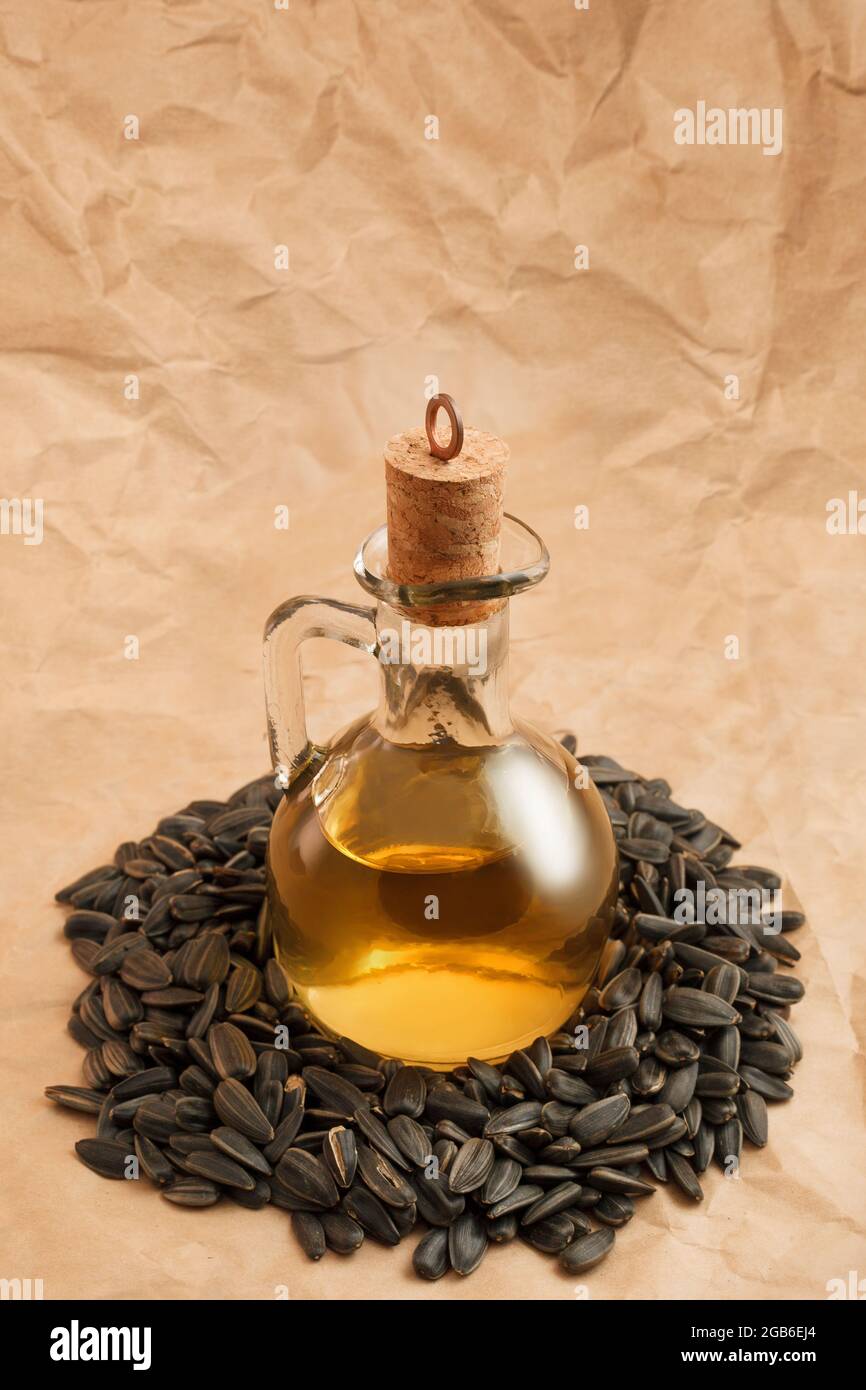decanter with sunflower oil on seeds Stock Photo - Alamy