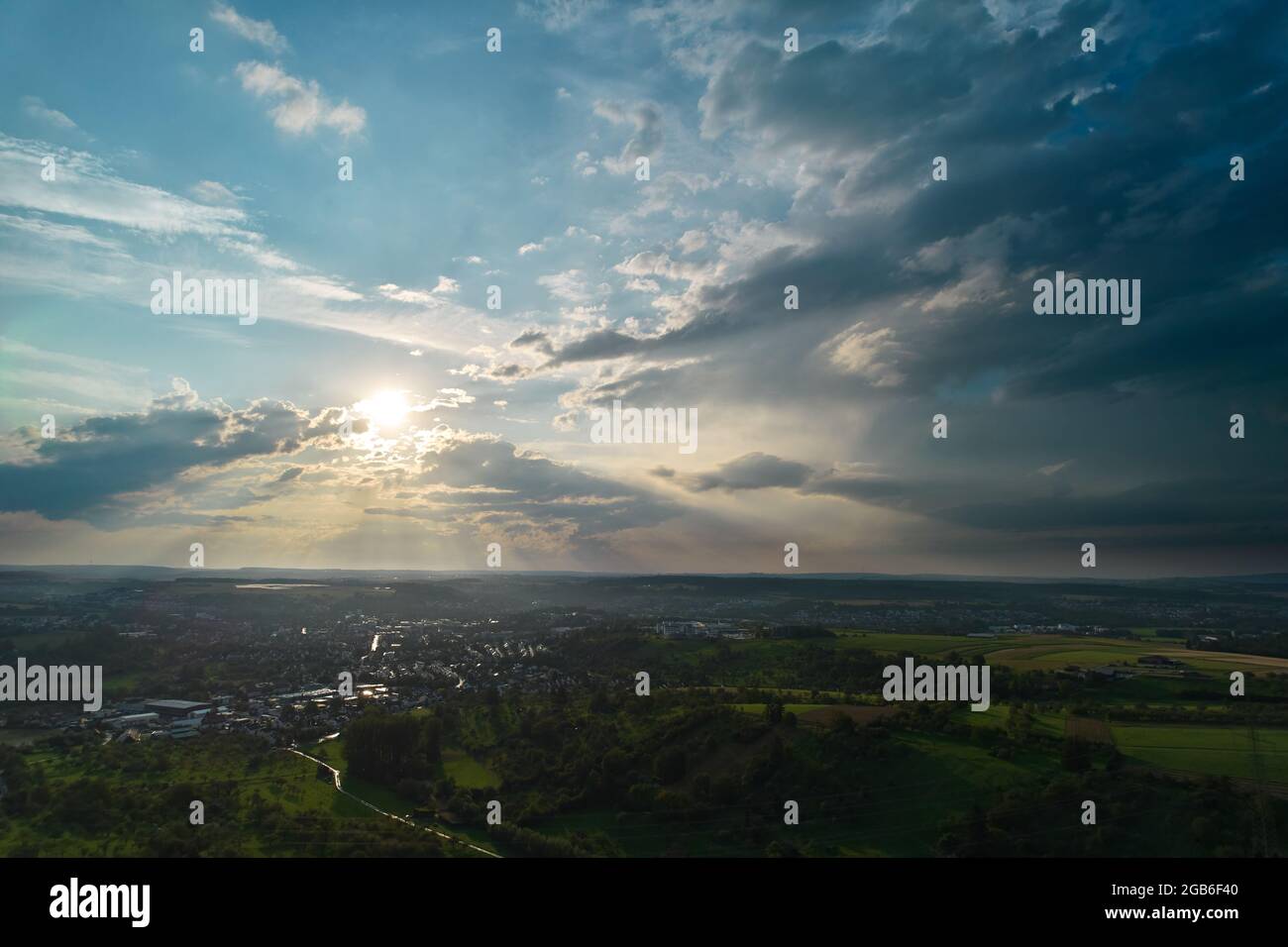 Aerial view of a german city near stuttgart. Just before sunset with ...