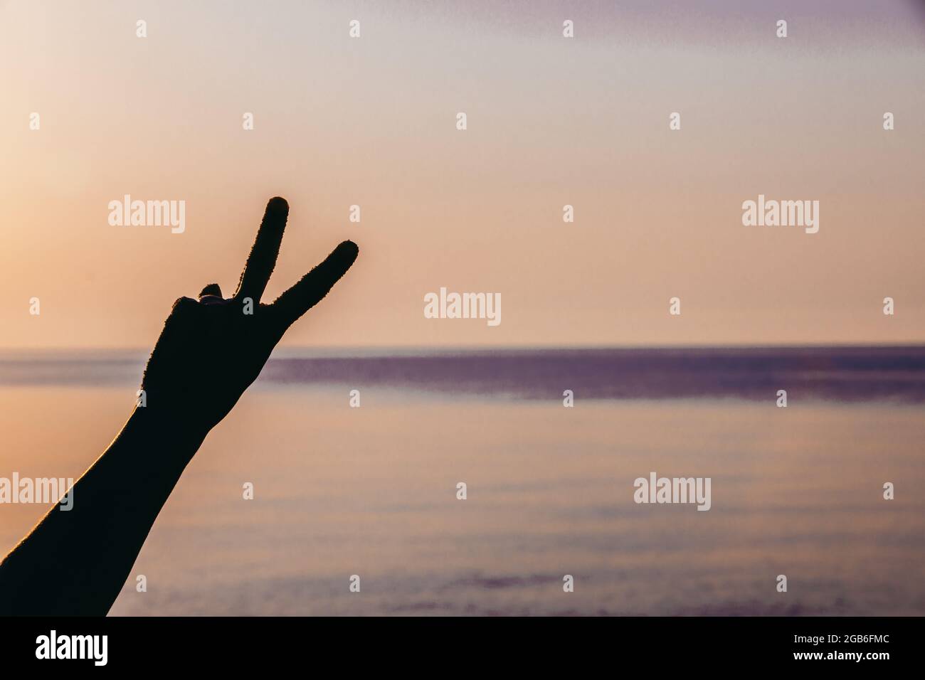man hand showing different symbol. carefree. freedom Stock Photo - Alamy