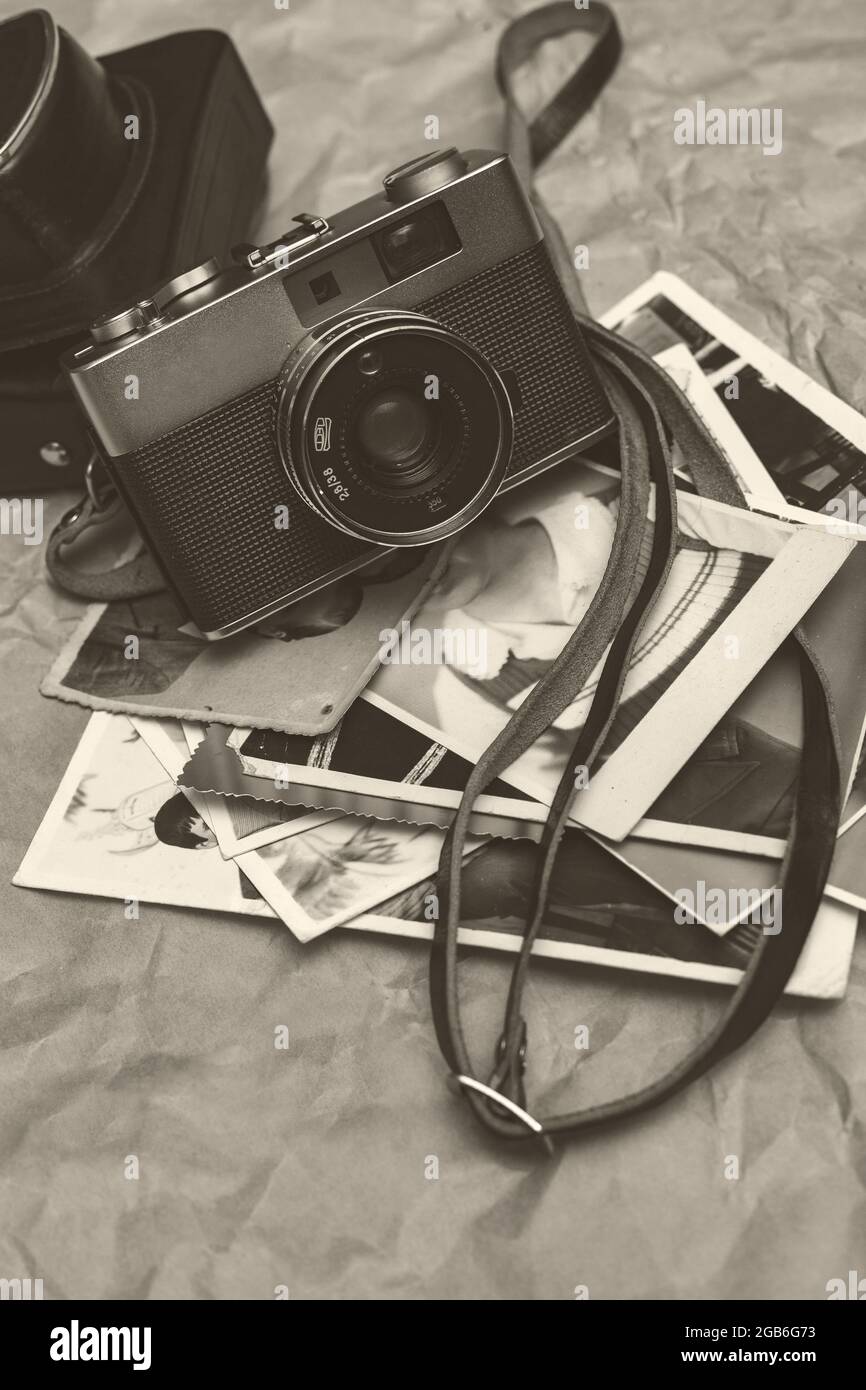 Vintage film camera on crumpled paper background. FED Mikron-2 ...