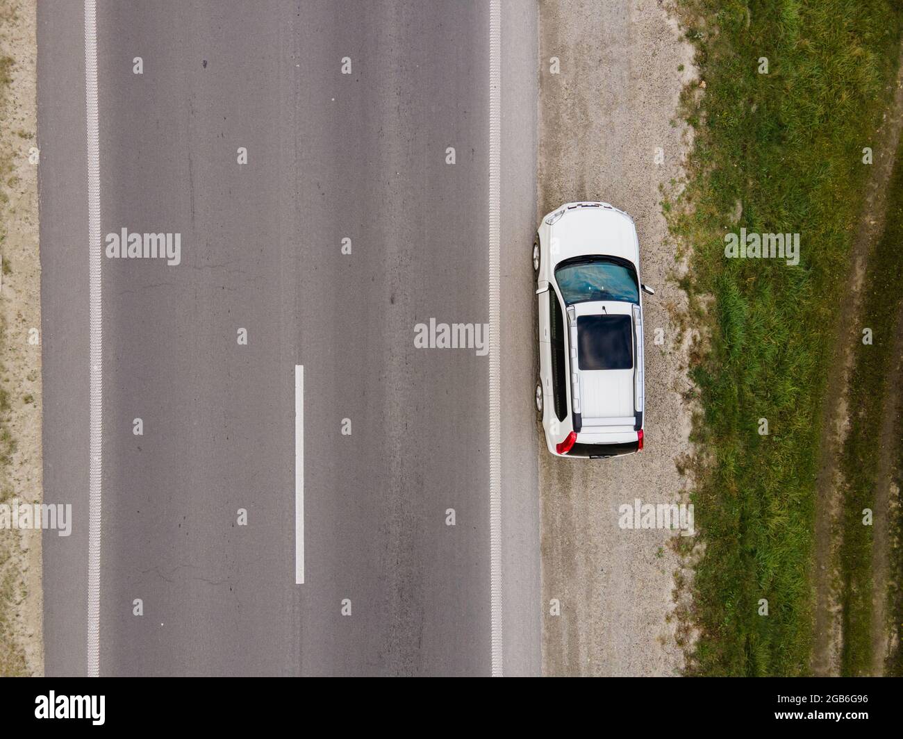 overhead top view of car parked at roadside copy space Stock Photo - Alamy